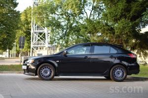 Melns Mitsubishi lancer-evolution 2011 Rīga, ar dzinēja tilpumu 2.00 L un nobraukumu 163 tūkst. km par 13500 €, foto 9 vietnē AUTOMOTO.COM.LV