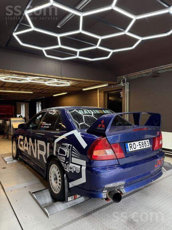 Blue Mitsubishi lancer-evolution 1996 in Ventspils, with an engine capacity of 2.00 L and mileage of 166 thousand km for 22000 €, photo 1 on AUTOMOTO.COM.LV