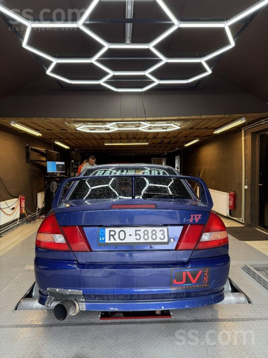 Blue Mitsubishi lancer-evolution 1996 in Ventspils, with an engine capacity of 2.00 L and mileage of 166 thousand km for 19500 €, photo 3 on AUTOMOTO.COM.LV