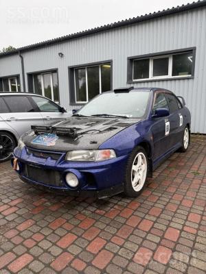 Blue Mitsubishi lancer-evolution 1996 in Ventspils, with an engine capacity of 2.00 L and mileage of 166 thousand km for 19500 €, photo 6 on AUTOMOTO.COM.LV