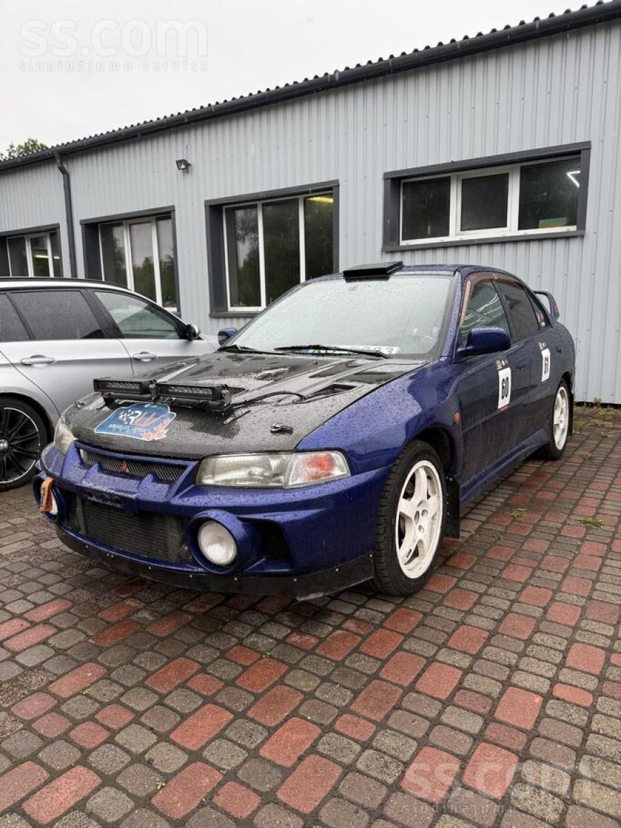 Blue Mitsubishi lancer-evolution 1996 in Ventspils, with an engine capacity of 2.00 L and mileage of 166 thousand km for 19500 €, photo 6 on AUTOMOTO.COM.LV