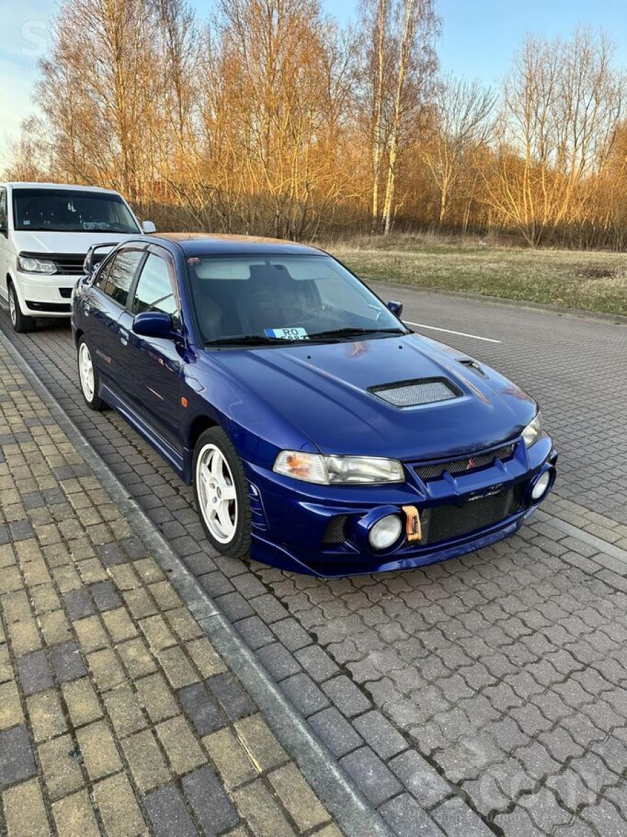 Blue Mitsubishi lancer-evolution 1996 in Ventspils, with an engine capacity of 2.00 L and mileage of 166 thousand km for 19500 €, photo 8 on AUTOMOTO.COM.LV
