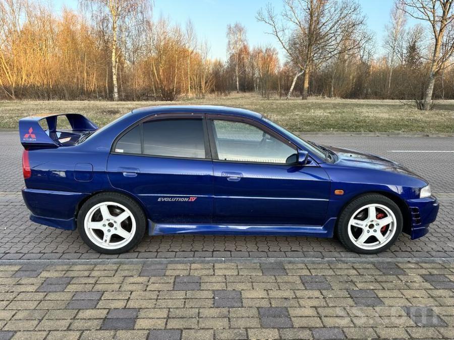 Blue Mitsubishi lancer-evolution 1996 in Ventspils, with an engine capacity of 2.00 L and mileage of 166 thousand km for 19500 €, photo 9 on AUTOMOTO.COM.LV