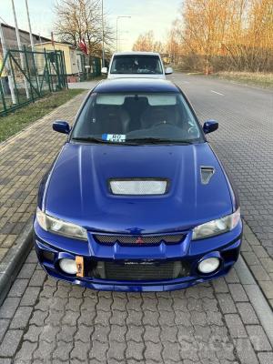 Blue Mitsubishi lancer-evolution 1996 in Ventspils, with an engine capacity of 2.00 L and mileage of 166 thousand km for 19500 €, photo 11 on AUTOMOTO.COM.LV