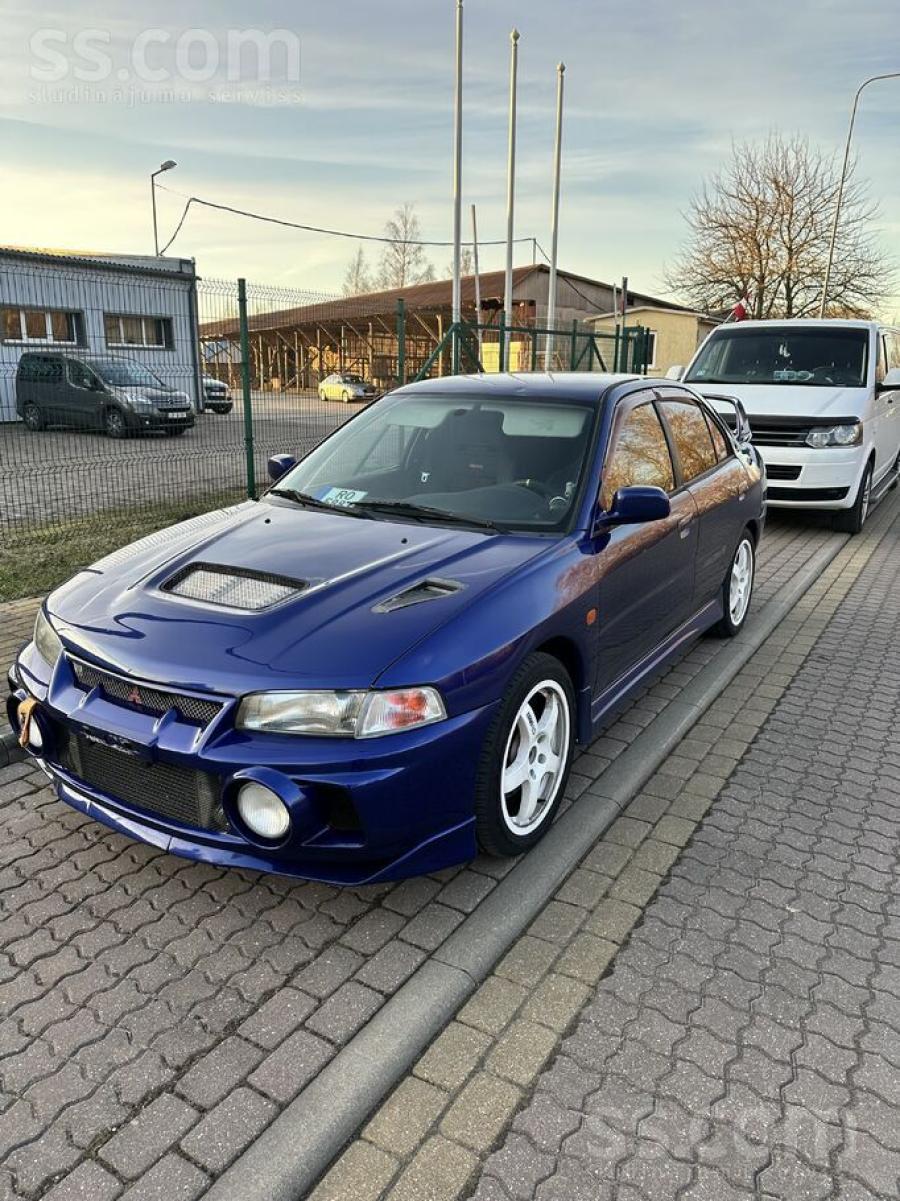 Blue Mitsubishi lancer-evolution 1996 in Ventspils, with an engine capacity of 2.00 L and mileage of 166 thousand km for 19500 €, photo 12 on AUTOMOTO.COM.LV