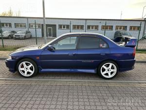 Blue Mitsubishi lancer-evolution 1996 in Ventspils, with an engine capacity of 2.00 L and mileage of 166 thousand km for 19500 €, photo 14 on AUTOMOTO.COM.LV