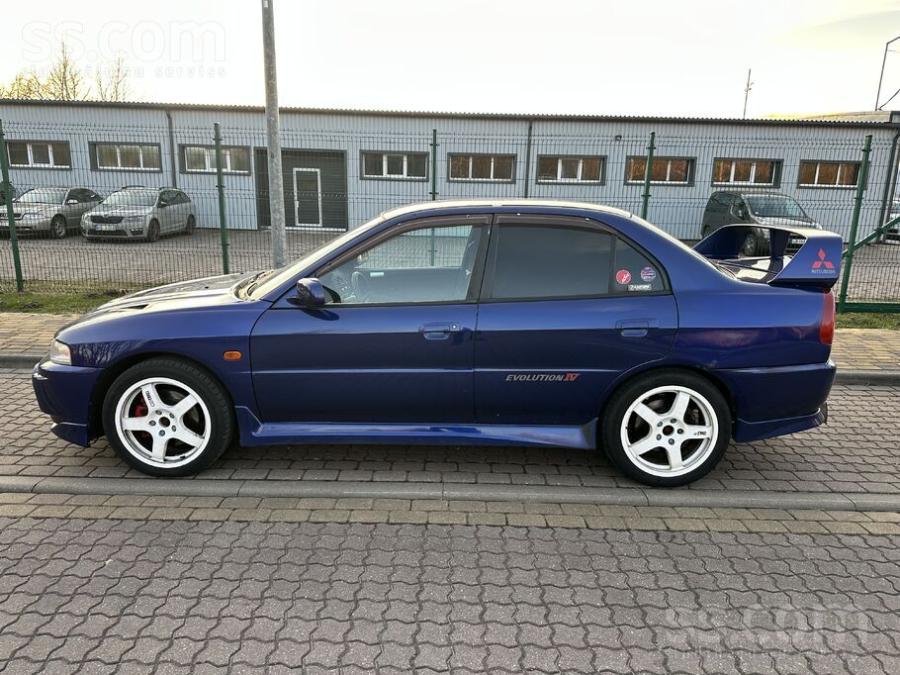 Blue Mitsubishi lancer-evolution 1996 in Ventspils, with an engine capacity of 2.00 L and mileage of 166 thousand km for 19500 €, photo 14 on AUTOMOTO.COM.LV