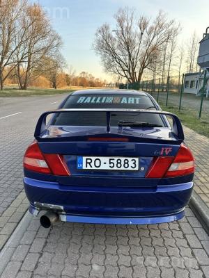 Blue Mitsubishi lancer-evolution 1996 in Ventspils, with an engine capacity of 2.00 L and mileage of 166 thousand km for 19500 €, photo 15 on AUTOMOTO.COM.LV