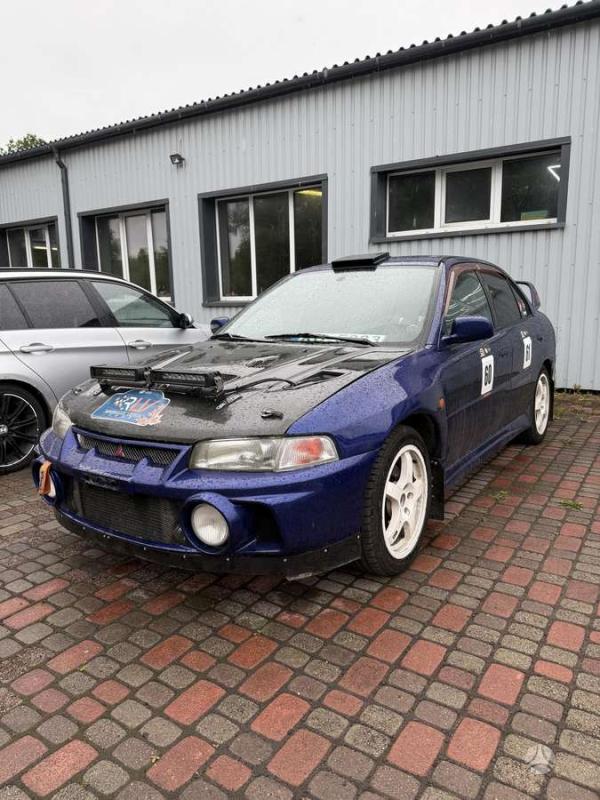 Blue Mitsubishi lancer-evolution 1996 in Ventspils, with an engine capacity of 0.00 L and mileage of 121 thousand km for 21500 €, photo 5 on AUTOMOTO.COM.LV