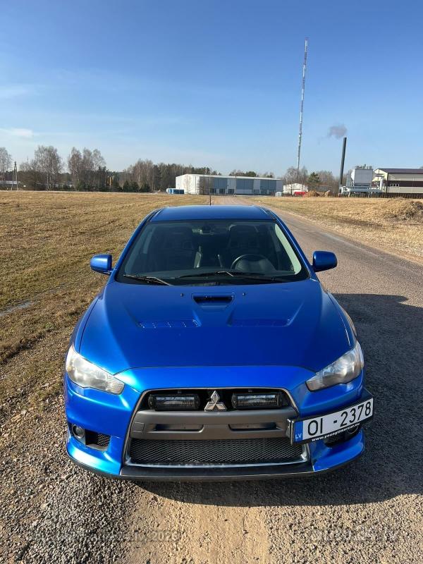 Blue Mitsubishi lancer-evolution 2008 in Riga, with an engine capacity of 2.00 L and mileage of 204 thousand km for 16900 €, photo 2 on AUTOMOTO.COM.LV