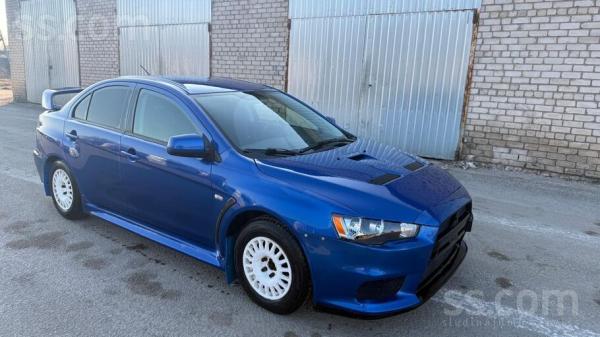 Blue Mitsubishi lancer-evolution 2010 in Saldus, with an engine capacity of 2.00 L and mileage of 160 thousand km for 22385 €, photo 2 on AUTOMOTO.COM.LV
