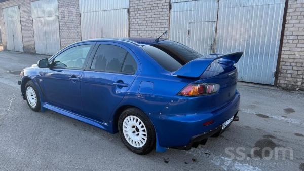 Blue Mitsubishi lancer-evolution 2010 in Saldus, with an engine capacity of 2.00 L and mileage of 160 thousand km for 22385 €, photo 3 on AUTOMOTO.COM.LV