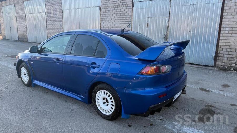 Blue Mitsubishi lancer-evolution 2010 in Saldus, with an engine capacity of 2.00 L and mileage of 160 thousand km for 22385 €, photo 4 on AUTOMOTO.COM.LV