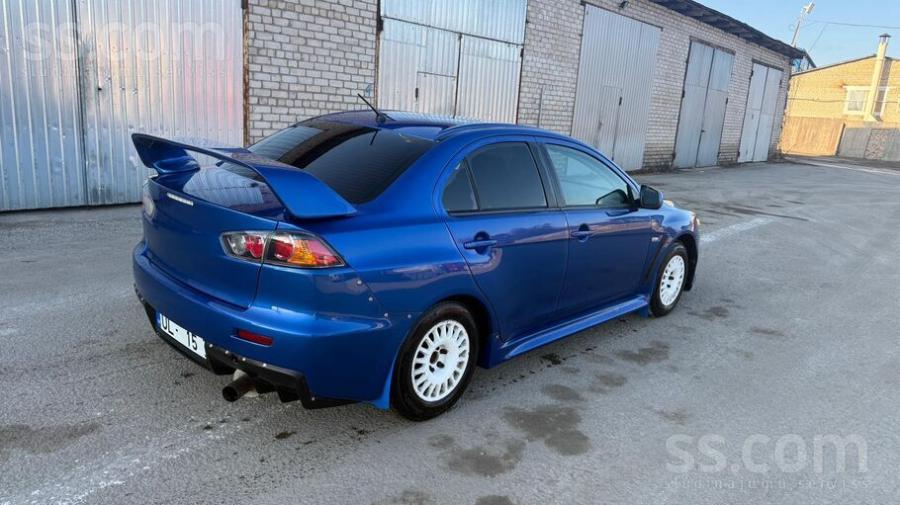 Blue Mitsubishi lancer-evolution 2010 in Saldus, with an engine capacity of 2.00 L and mileage of 160 thousand km for 22385 €, photo 5 on AUTOMOTO.COM.LV