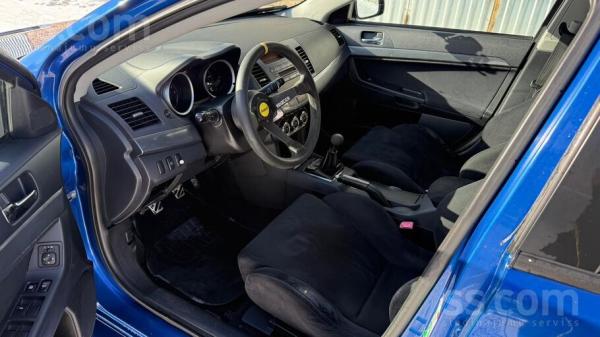 Blue Mitsubishi lancer-evolution 2010 in Saldus, with an engine capacity of 2.00 L and mileage of 160 thousand km for 22385 €, photo 5 on AUTOMOTO.COM.LV