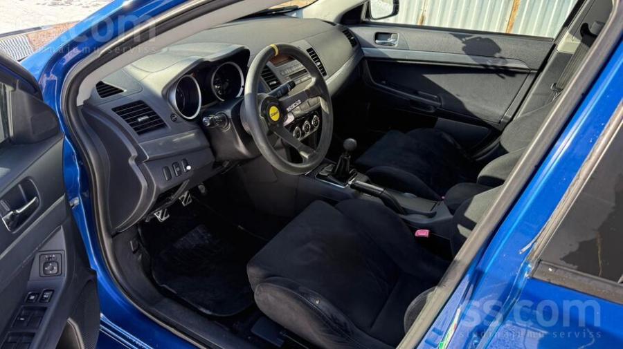 Blue Mitsubishi lancer-evolution 2010 in Saldus, with an engine capacity of 2.00 L and mileage of 160 thousand km for 22385 €, photo 6 on AUTOMOTO.COM.LV