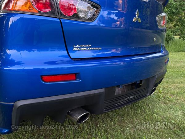 Zils Mitsubishi lancer-evolution 2012 Tallina, ar dzinēja tilpumu 2.00 L un nobraukumu 128 tūkst. km par 15579 €, foto 5 vietnē AUTOMOTO.COM.LV