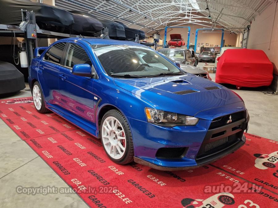 Blue Mitsubishi lancer-evolution 2012 in Tallinn, with an engine capacity of 2.00 L and mileage of 33 thousand km for 37900 €, photo 1 on AUTOMOTO.COM.LV