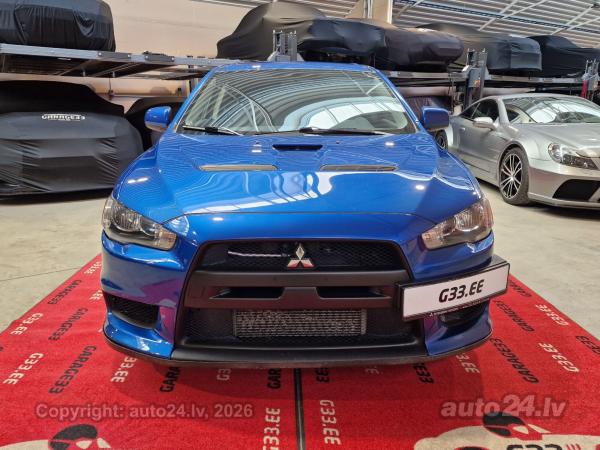 Blue Mitsubishi lancer-evolution 2012 in Tallinn, with an engine capacity of 2.00 L and mileage of 33 thousand km for 37900 €, photo 2 on AUTOMOTO.COM.LV