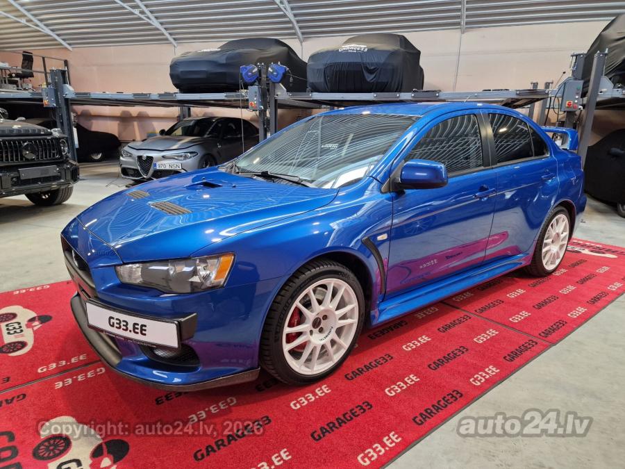 Blue Mitsubishi lancer-evolution 2012 in Tallinn, with an engine capacity of 2.00 L and mileage of 33 thousand km for 37900 €, photo 4 on AUTOMOTO.COM.LV
