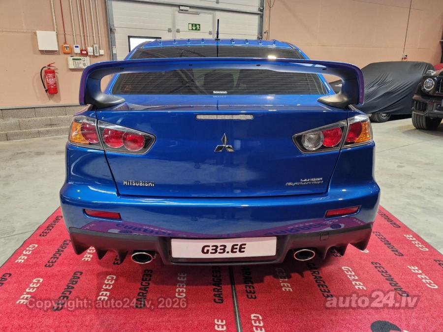 Blue Mitsubishi lancer-evolution 2012 in Tallinn, with an engine capacity of 2.00 L and mileage of 33 thousand km for 37900 €, photo 6 on AUTOMOTO.COM.LV