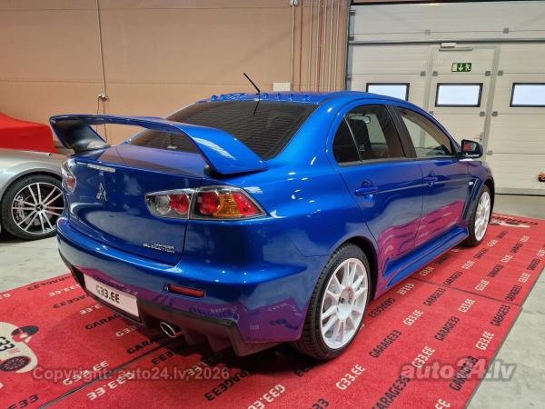 Blue Mitsubishi lancer-evolution 2012 in Tallinn, with an engine capacity of 2.00 L and mileage of 33 thousand km for 37900 €, photo 6 on AUTOMOTO.COM.LV