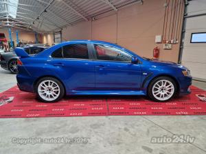 Blue Mitsubishi lancer-evolution 2012 in Tallinn, with an engine capacity of 2.00 L and mileage of 33 thousand km for 37900 €, photo 8 on AUTOMOTO.COM.LV