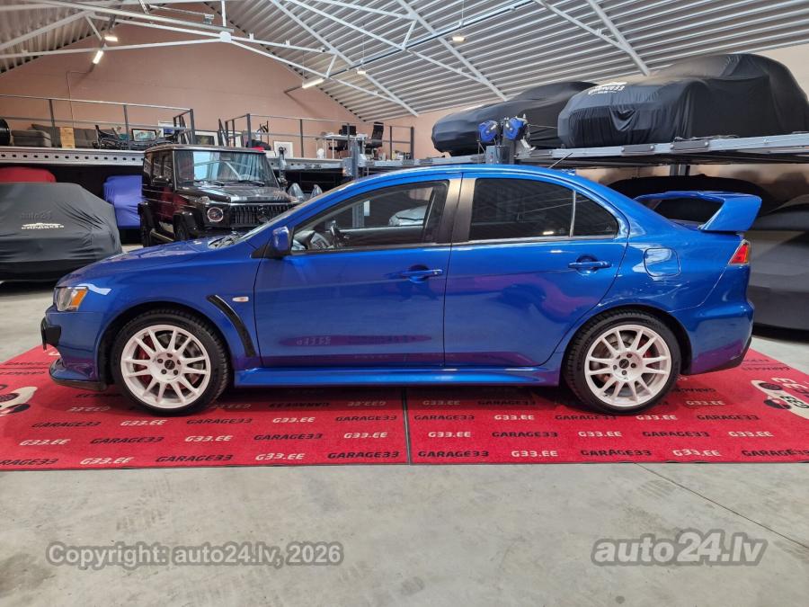 Blue Mitsubishi lancer-evolution 2012 in Tallinn, with an engine capacity of 2.00 L and mileage of 33 thousand km for 37900 €, photo 9 on AUTOMOTO.COM.LV