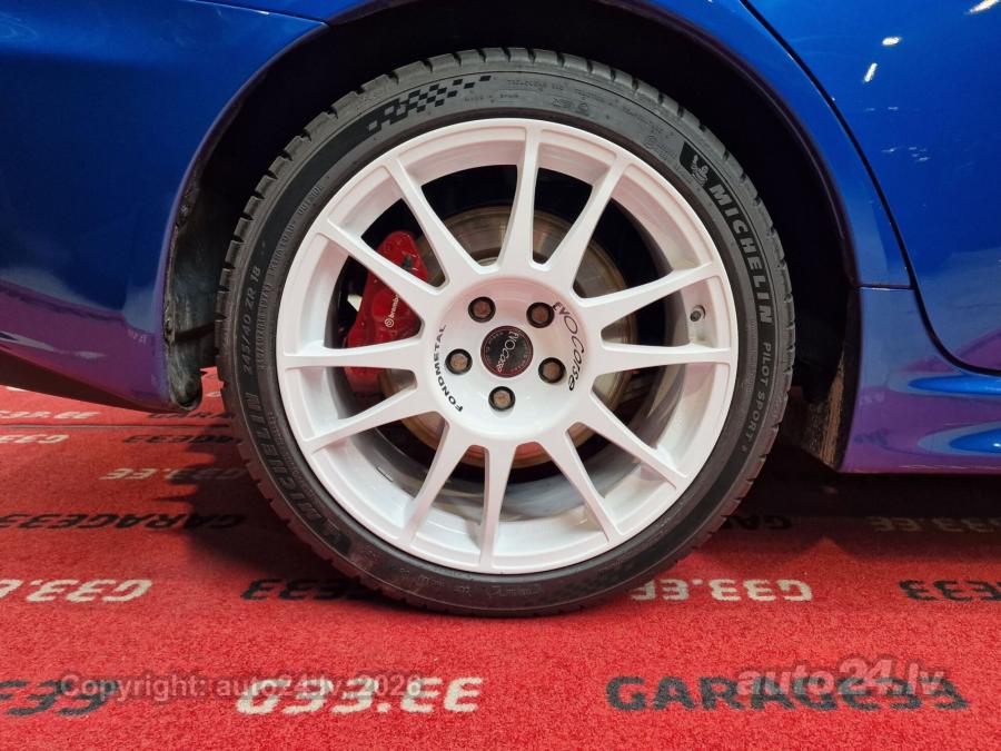 Blue Mitsubishi lancer-evolution 2012 in Tallinn, with an engine capacity of 2.00 L and mileage of 33 thousand km for 37900 €, photo 11 on AUTOMOTO.COM.LV