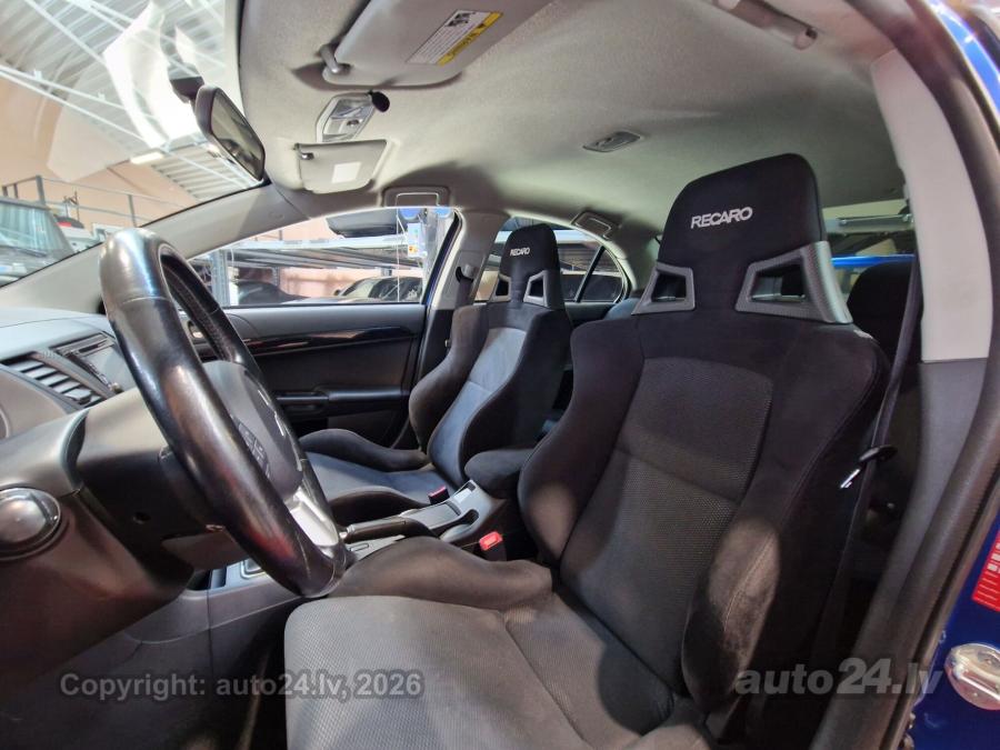 Blue Mitsubishi lancer-evolution 2012 in Tallinn, with an engine capacity of 2.00 L and mileage of 33 thousand km for 37900 €, photo 13 on AUTOMOTO.COM.LV