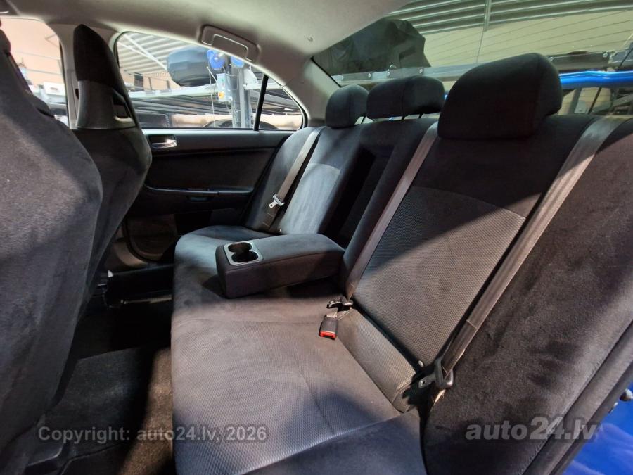 Blue Mitsubishi lancer-evolution 2012 in Tallinn, with an engine capacity of 2.00 L and mileage of 33 thousand km for 37900 €, photo 20 on AUTOMOTO.COM.LV