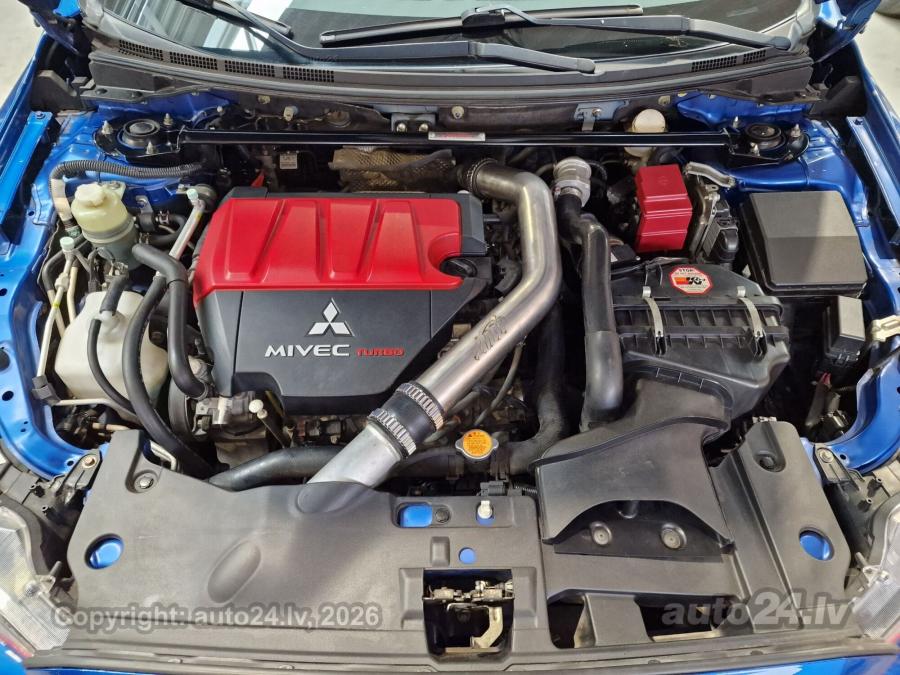 Blue Mitsubishi lancer-evolution 2012 in Tallinn, with an engine capacity of 2.00 L and mileage of 33 thousand km for 37900 €, photo 23 on AUTOMOTO.COM.LV