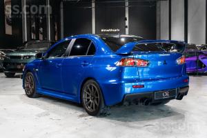 Blue Mitsubishi lancer-evolution 2012 in Riga, with an engine capacity of 2.00 L and mileage of 185 thousand km for 37500 €, photo 7 on AUTOMOTO.COM.LV