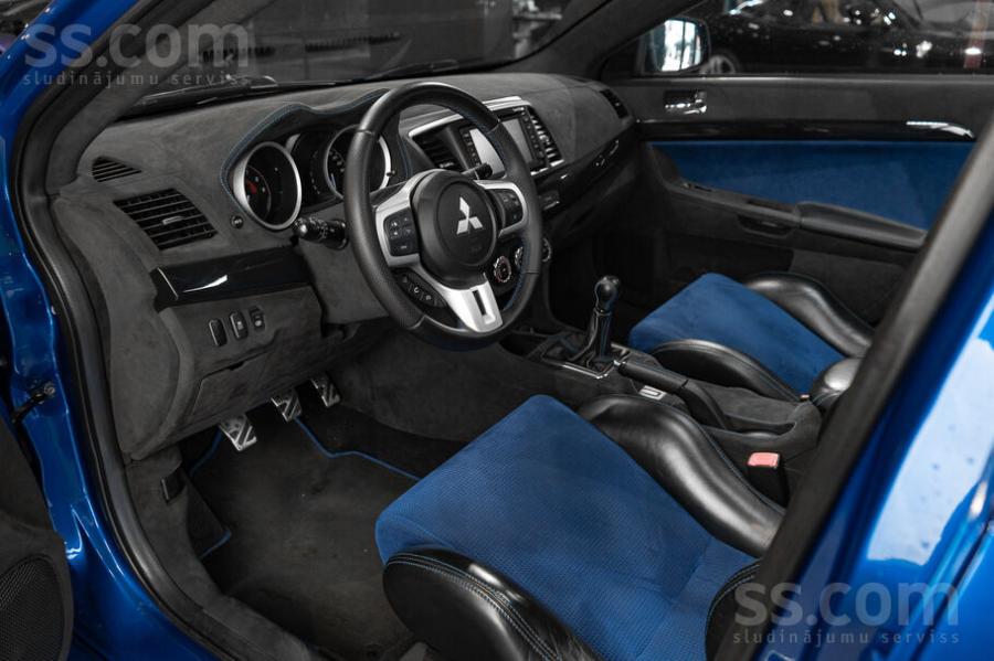 Blue Mitsubishi lancer-evolution 2012 in Riga, with an engine capacity of 2.00 L and mileage of 185 thousand km for 37500 €, photo 10 on AUTOMOTO.COM.LV