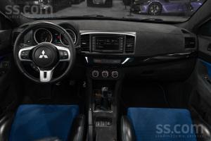 Blue Mitsubishi lancer-evolution 2012 in Riga, with an engine capacity of 2.00 L and mileage of 185 thousand km for 37500 €, photo 12 on AUTOMOTO.COM.LV