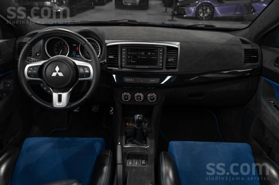 Blue Mitsubishi lancer-evolution 2012 in Riga, with an engine capacity of 2.00 L and mileage of 185 thousand km for 37500 €, photo 12 on AUTOMOTO.COM.LV