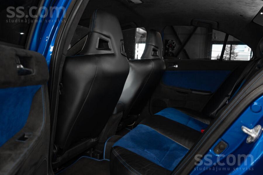 Blue Mitsubishi lancer-evolution 2012 in Riga, with an engine capacity of 2.00 L and mileage of 185 thousand km for 37500 €, photo 15 on AUTOMOTO.COM.LV