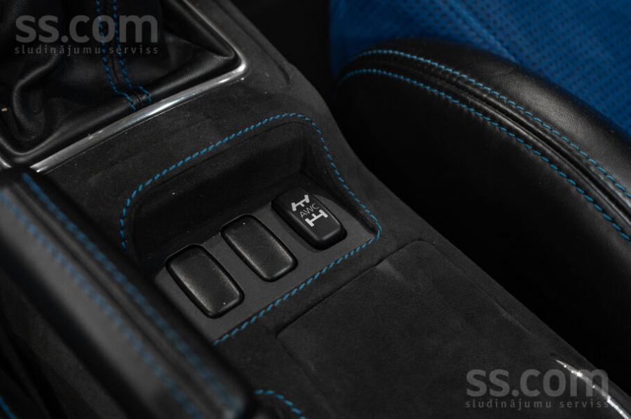 Blue Mitsubishi lancer-evolution 2012 in Riga, with an engine capacity of 2.00 L and mileage of 185 thousand km for 37500 €, photo 26 on AUTOMOTO.COM.LV
