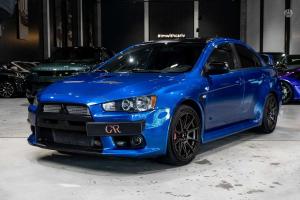 Zils Mitsubishi lancer-evolution 2012 Rīga, ar dzinēja tilpumu 2.00 L un nobraukumu 185 tūkst. km par 37500 €, foto  vietnē AUTOMOTO.COM.LV