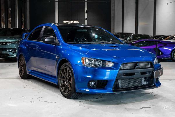 Zils Mitsubishi lancer-evolution 2012 Rīga, ar dzinēja tilpumu 2.00 L un nobraukumu 185 tūkst. km par 37500 €, foto 3 vietnē AUTOMOTO.COM.LV