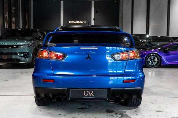 Zils Mitsubishi lancer-evolution 2012 Rīga, ar dzinēja tilpumu 2.00 L un nobraukumu 185 tūkst. km par 37500 €, foto 5 vietnē AUTOMOTO.COM.LV