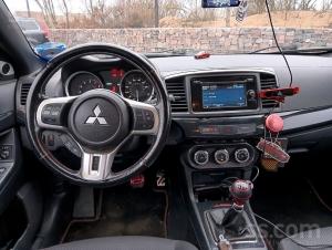 Blue Mitsubishi lancer-evolution 2015 in Riga, with an engine capacity of 2.00 L and mileage of 80 thousand km for 37000 €, photo 4 on AUTOMOTO.COM.LV