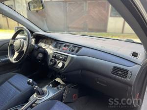 Pelēks Mitsubishi lancer-evolution 2004 Jūrmala, ar dzinēja tilpumu 2.00 L un nobraukumu 280 tūkst. km par 32500 €, foto 3 vietnē AUTOMOTO.COM.LV