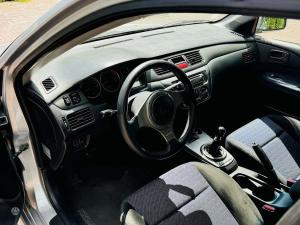 Pelēks Mitsubishi lancer-evolution 2005 Viļņa, ar dzinēja tilpumu 2.00 L un nobraukumu 131 tūkst. km par 38000 €, foto 9 vietnē AUTOMOTO.COM.LV