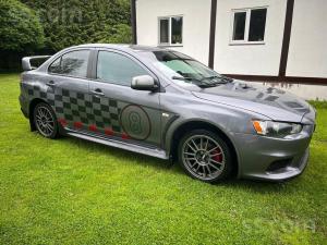 Pelēks Mitsubishi lancer-evolution 2010 Rīga, ar dzinēja tilpumu 2.00 L un nobraukumu 150 tūkst. km par 24000 €, foto 3 vietnē AUTOMOTO.COM.LV