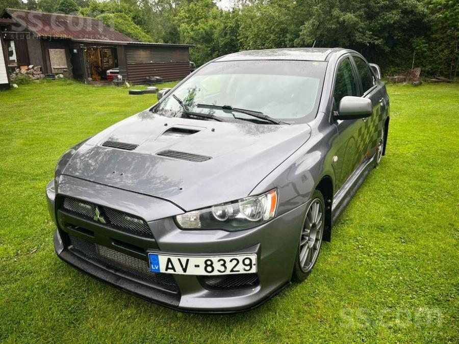Pelēks Mitsubishi lancer-evolution 2010 Rīga, ar dzinēja tilpumu 2.00 L un nobraukumu 150 tūkst. km par 24000 €, foto 5 vietnē AUTOMOTO.COM.LV