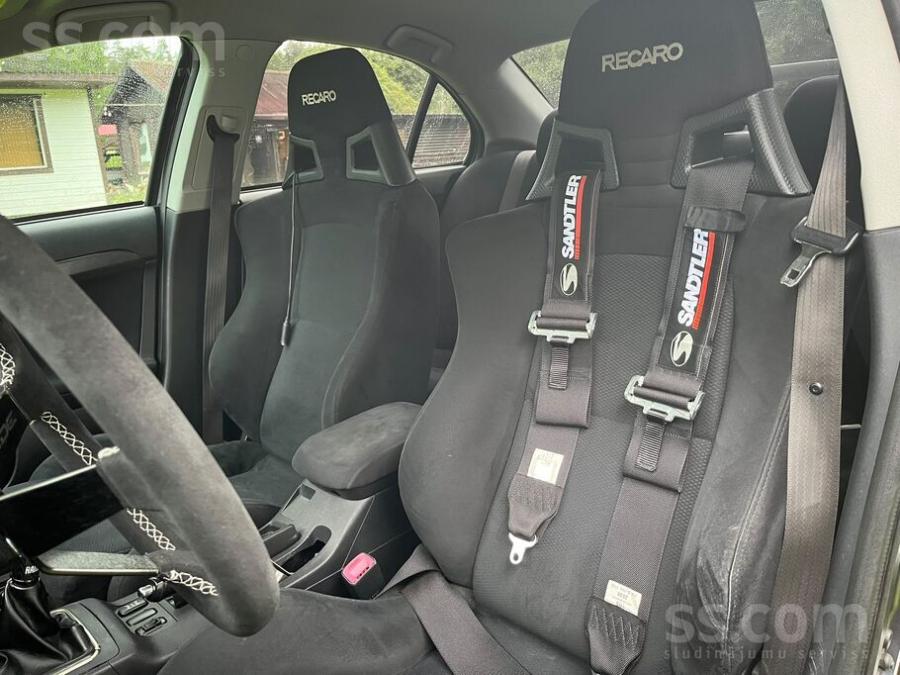 Pelēks Mitsubishi lancer-evolution 2010 Rīga, ar dzinēja tilpumu 2.00 L un nobraukumu 150 tūkst. km par 24000 €, foto 6 vietnē AUTOMOTO.COM.LV