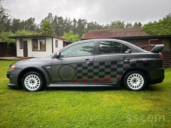 Pelēks Mitsubishi lancer-evolution 2010 Rīga, ar dzinēja tilpumu 2.00 L un nobraukumu 150 tūkst. km par 24000 €, foto 6 vietnē AUTOMOTO.COM.LV