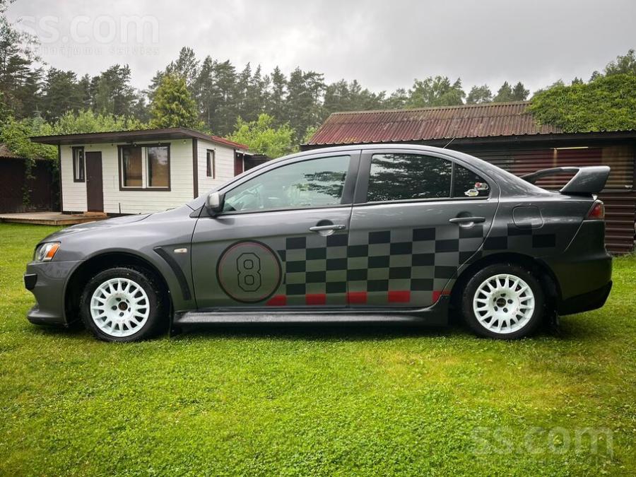 Pelēks Mitsubishi lancer-evolution 2010 Rīga, ar dzinēja tilpumu 2.00 L un nobraukumu 150 tūkst. km par 24000 €, foto 7 vietnē AUTOMOTO.COM.LV
