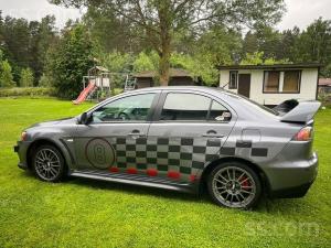 Pelēks Mitsubishi lancer-evolution 2010 Rīga, ar dzinēja tilpumu 2.00 L un nobraukumu 150 tūkst. km par 24000 €, foto 8 vietnē AUTOMOTO.COM.LV